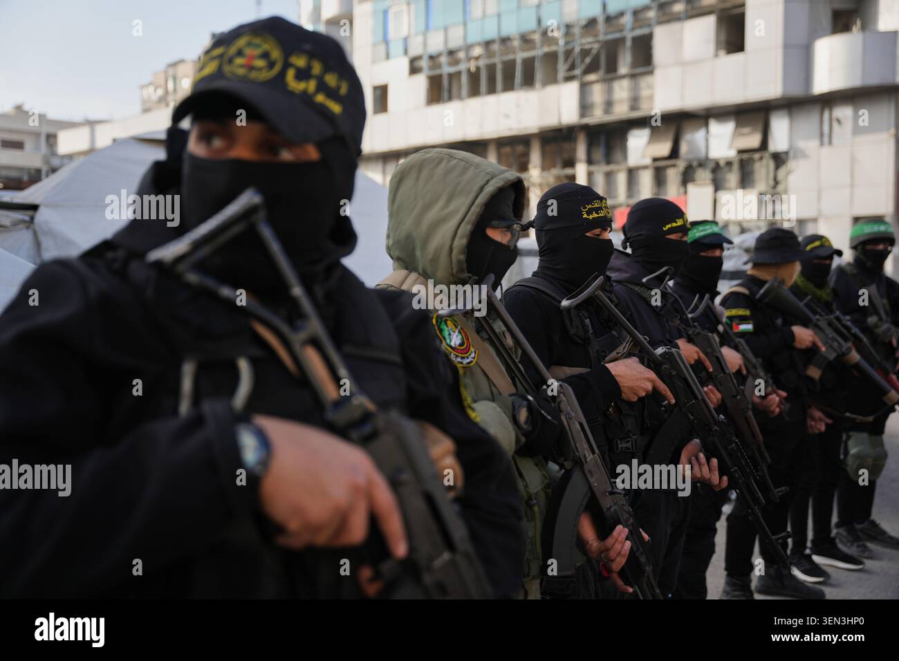 FILE - Armed Palestinian militants from Hamas and Islamic Jihad gather ...