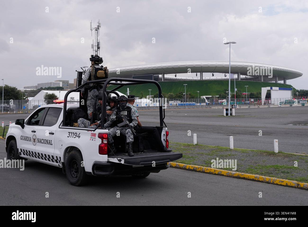 National Guard ride past the stadium that will host FIFA World Cup ...