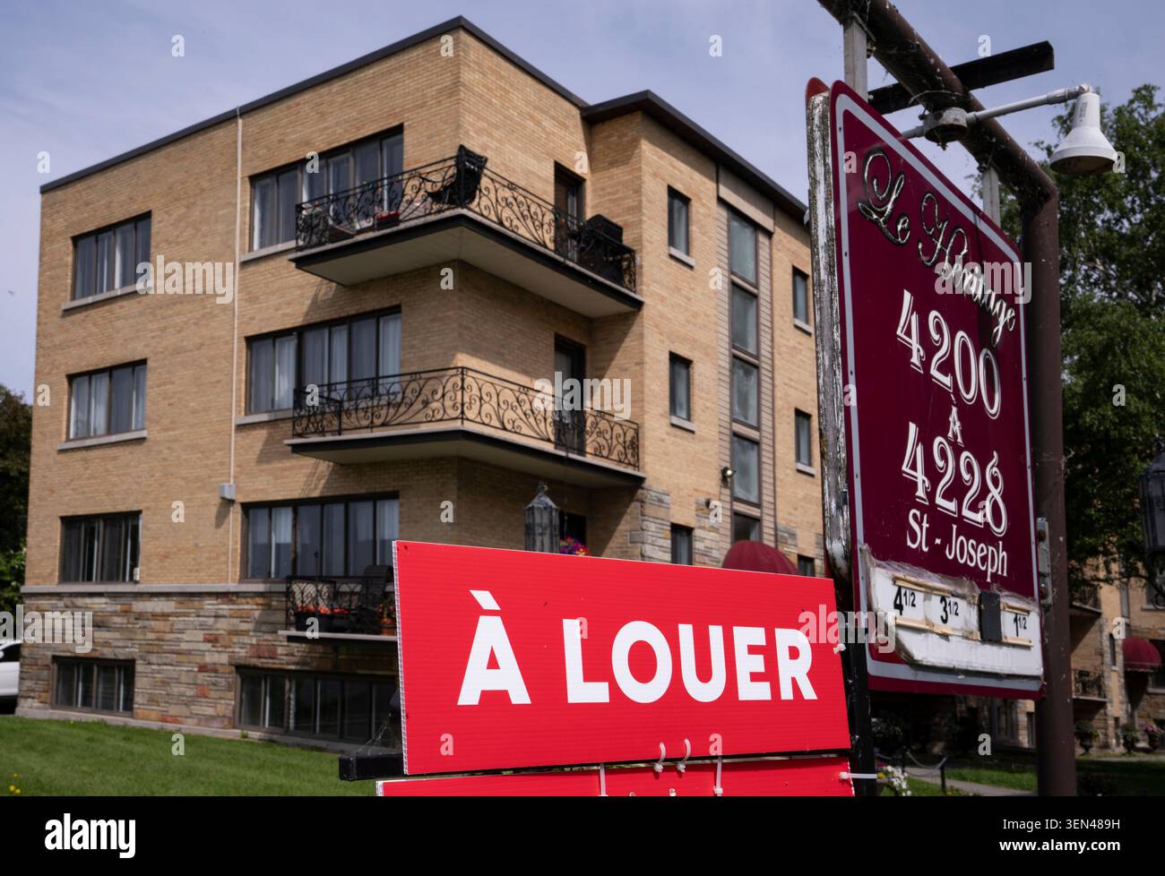 A "For Rent" sign is seen outside apartments in the Lachine borough of ...