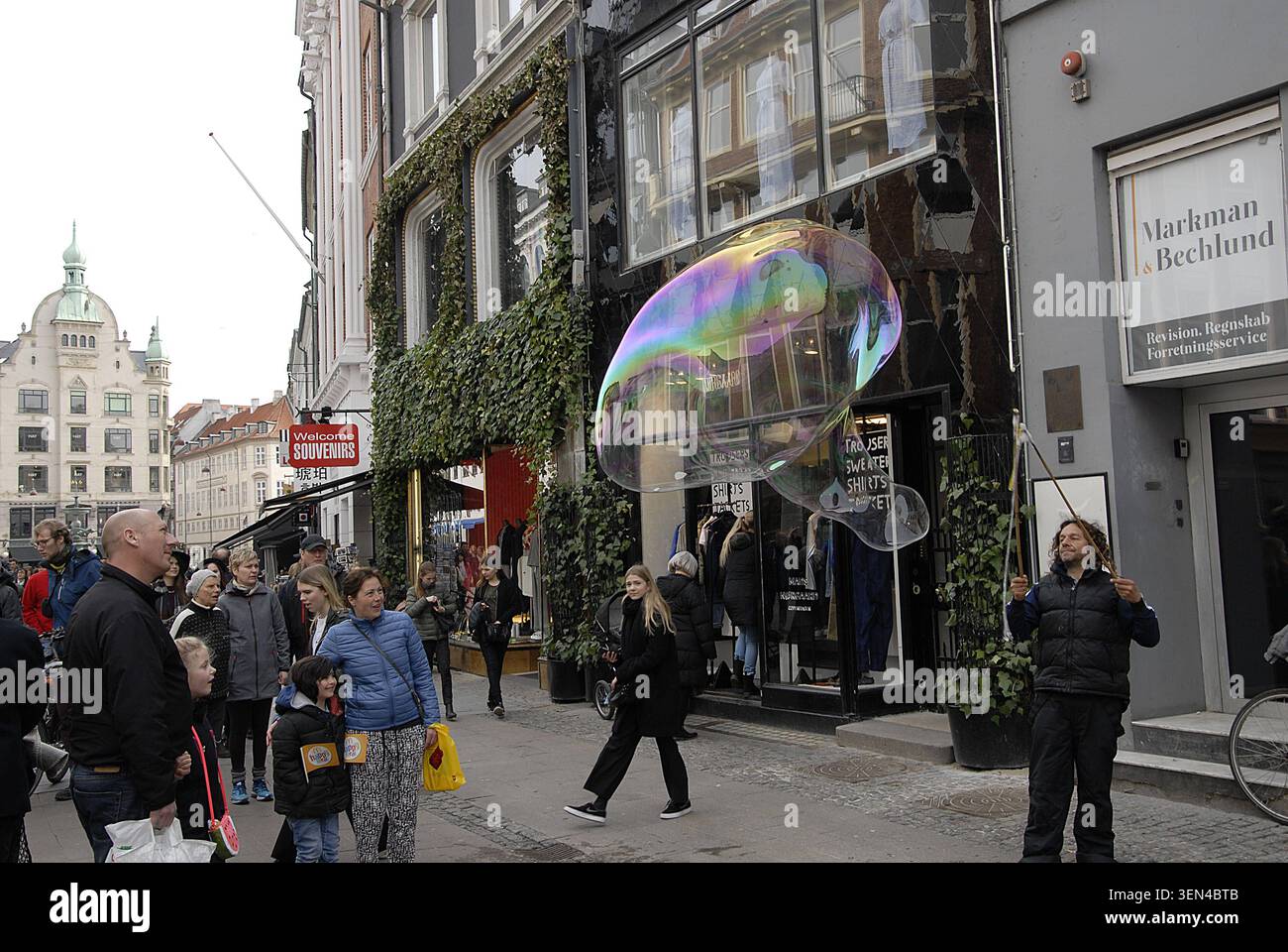 COPENHAGEN / DENMARK 02 April 2016 Male entertaining wih soap bubble on ...