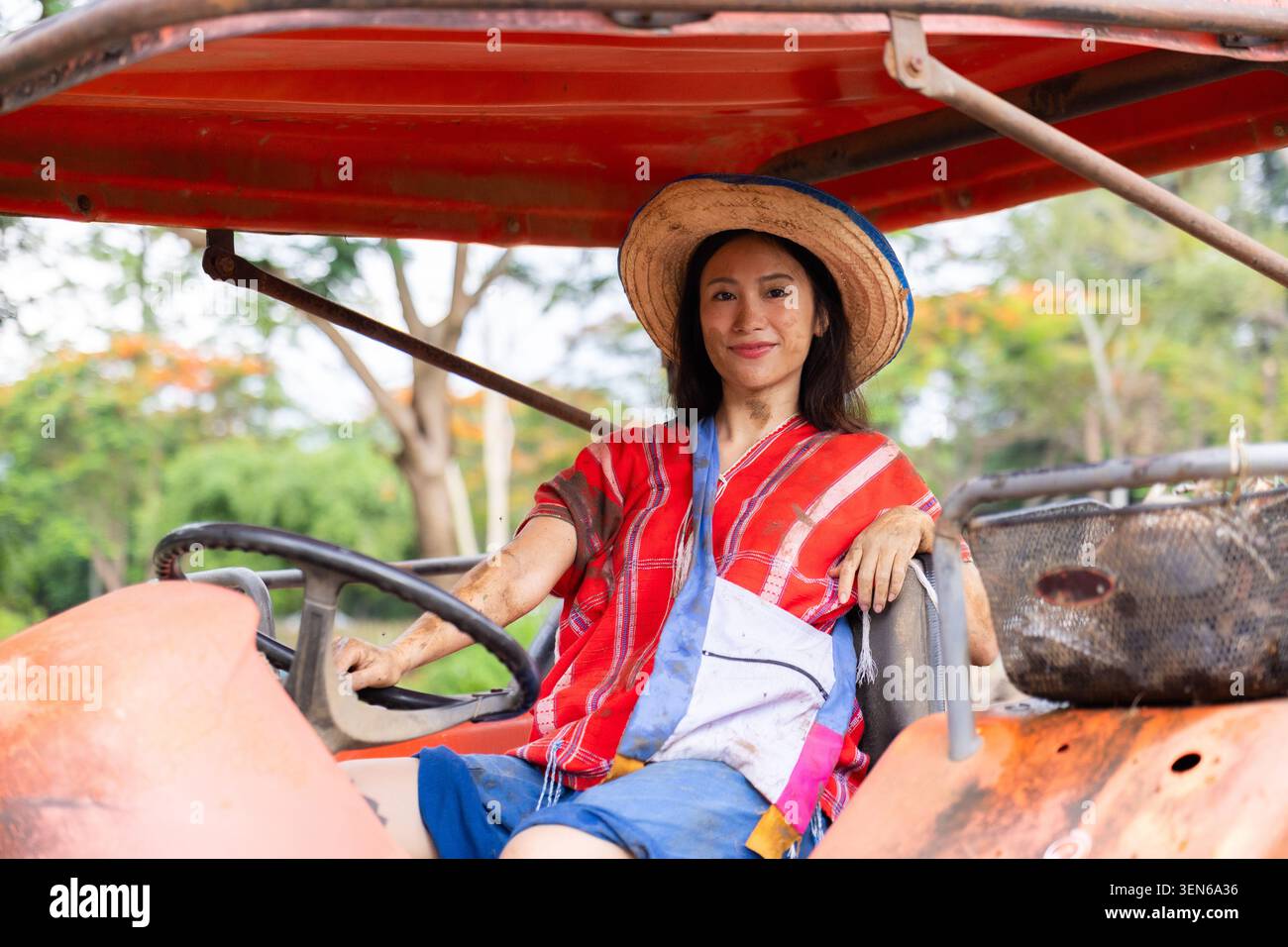 Woman tractor hat driver farm red rural vehicle agriculture outdoor ...