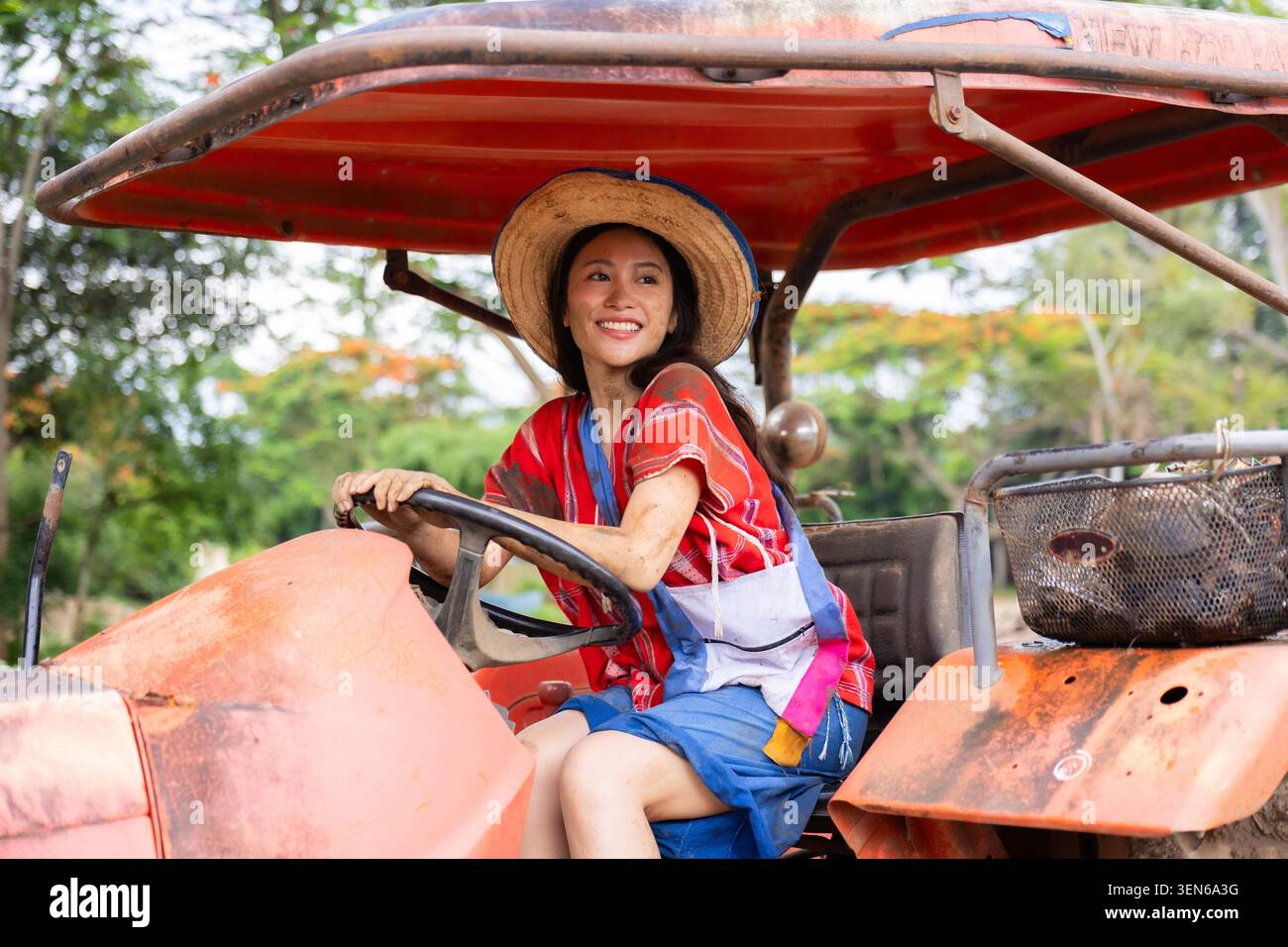 Woman tractor hat smile red vehicle farm rural driver portrait woman ...