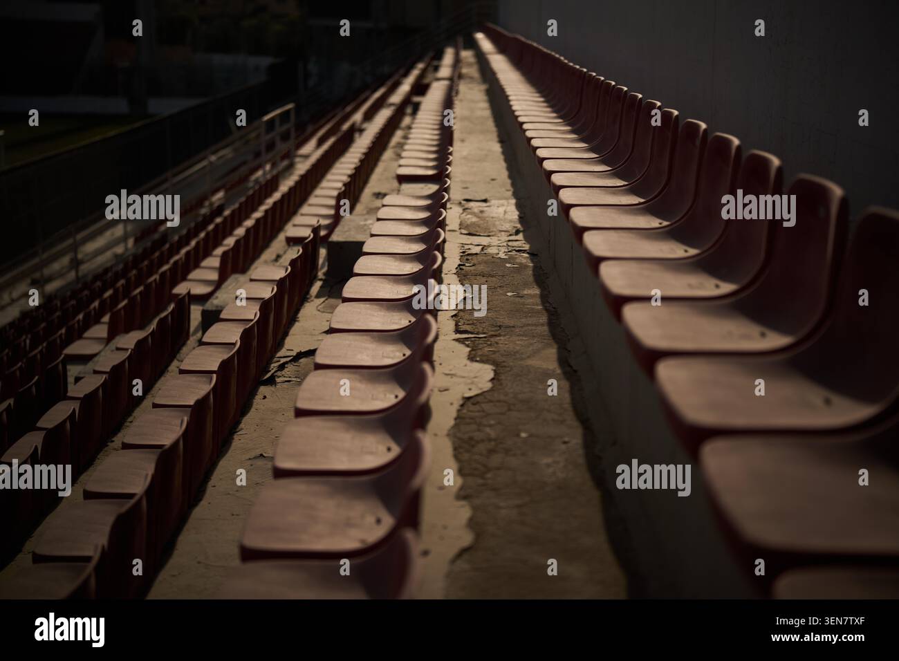 Empty seats line the grandstands at Faisal al-Husseini Stadium in the ...