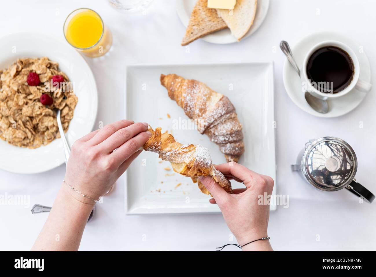 Delightful Breakfast Spread Featuring Croissants and Cereals With Fresh ...