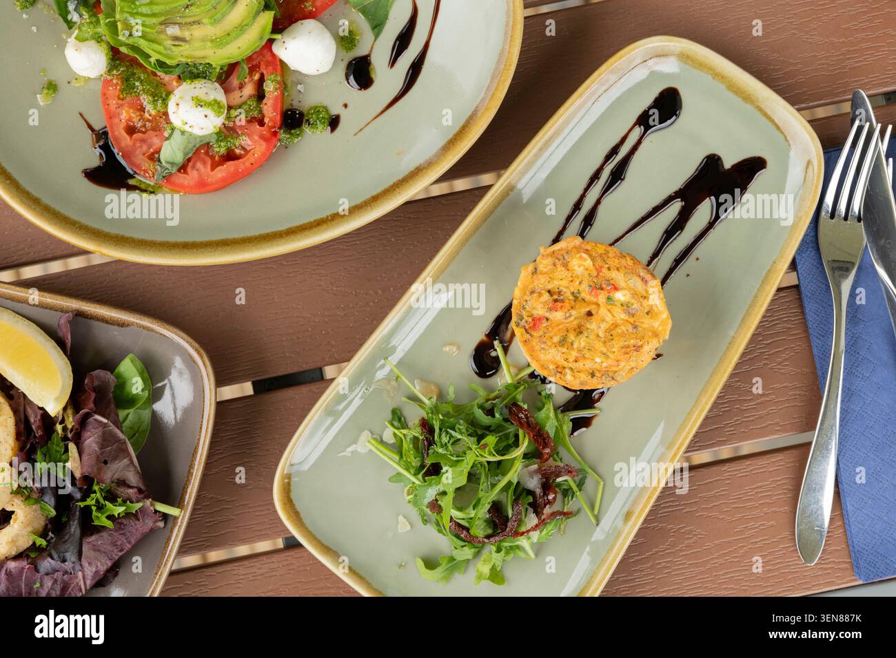 Delicious Gourmet Meal With Fresh Ingredients Served on Elegant Plates ...