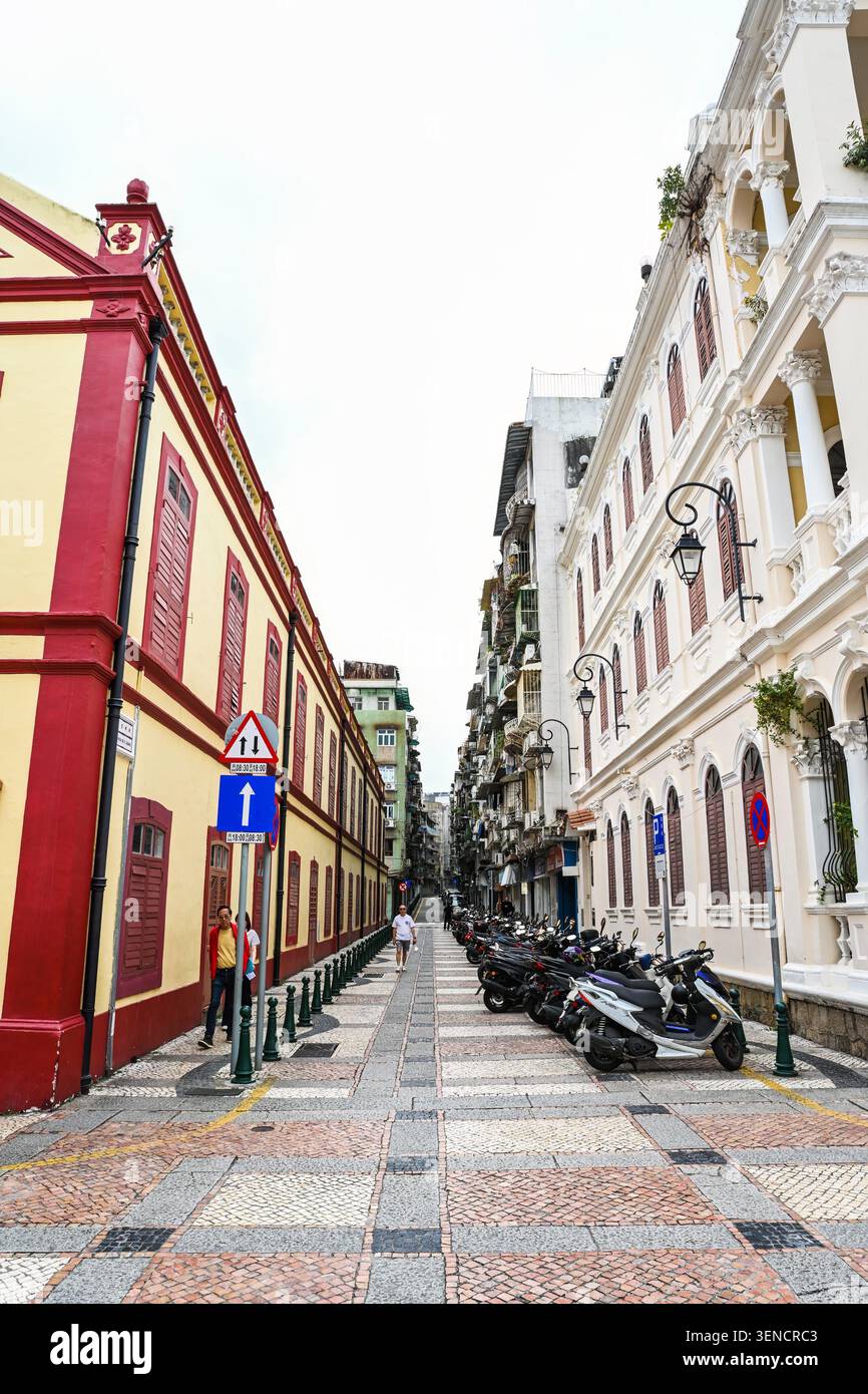 MACAU, CHINA, APRIL 1, 2026 Narrow street with historic Chui Lok Chi ...