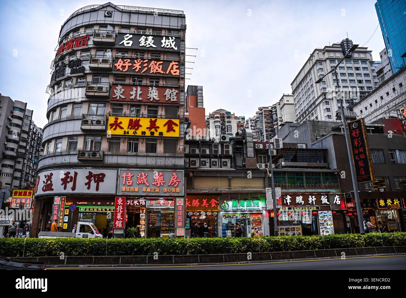 MACAU, CHINA, APRIL 1, 2026 Twilight view of a historic curved building ...