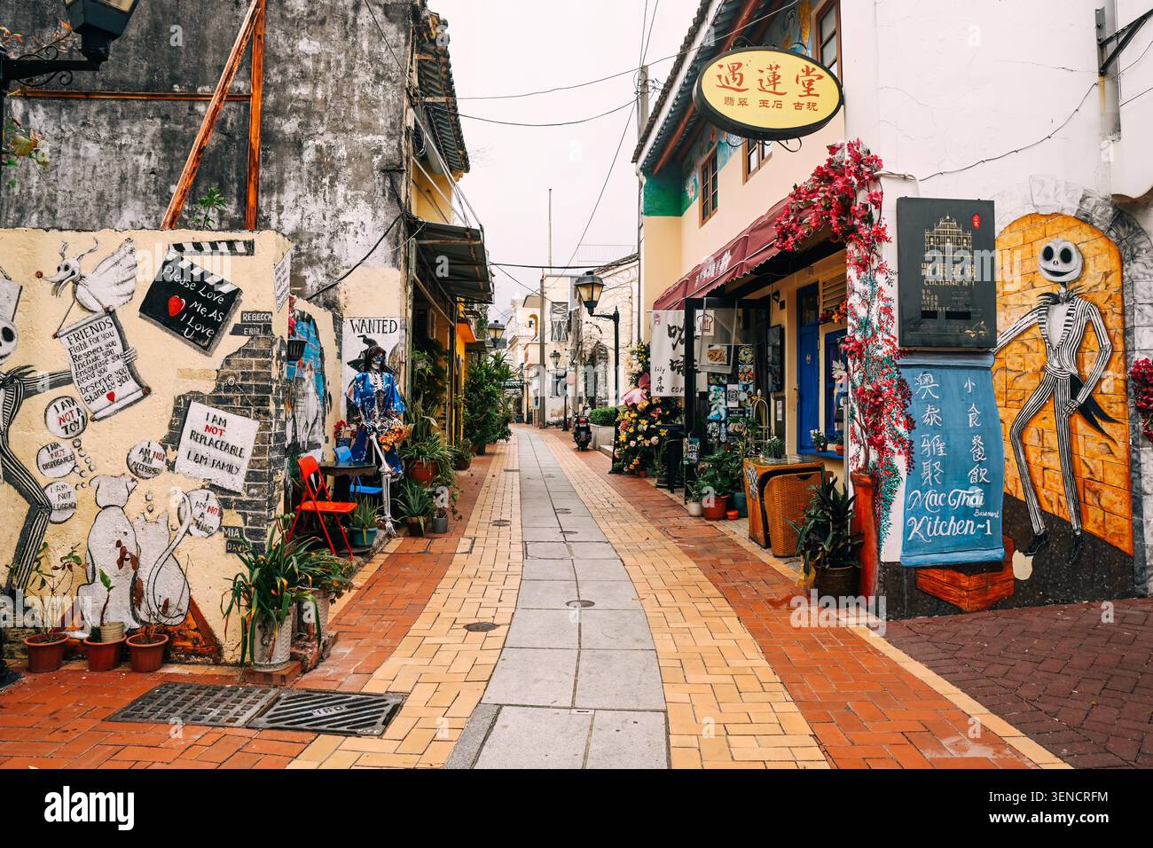 MACAU, CHINA, APRIL 3, 2026 Colorful narrow historic street alley at ...