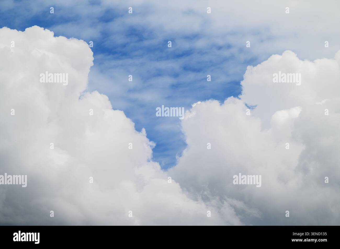 White summer clouds drifting across a vivid blue sky background Stock ...