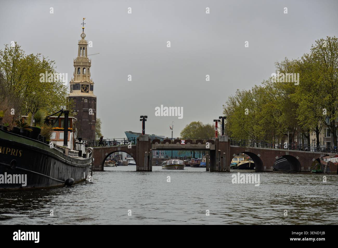 AMSTERDAM, NETHERLANDS - APRIL 2, 2026: Historic Montelbaanstoren tower ...