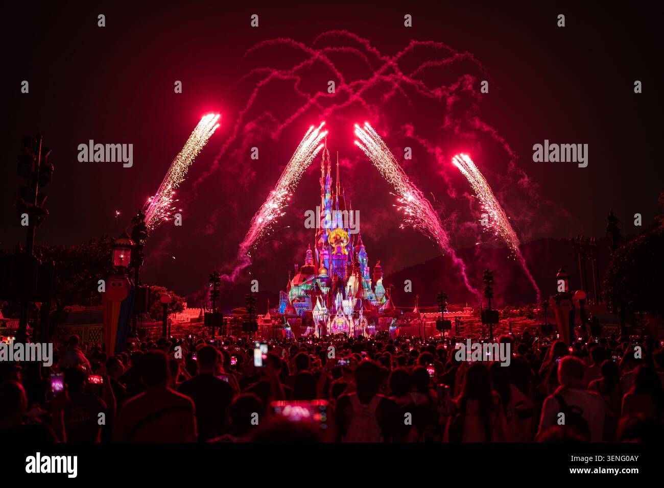 Visitors viewing a Fireworks display at the magic castle at Hong Kong ...