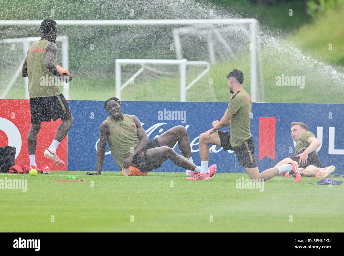 Canadian players stretch during a Team Canada World Cup training ...