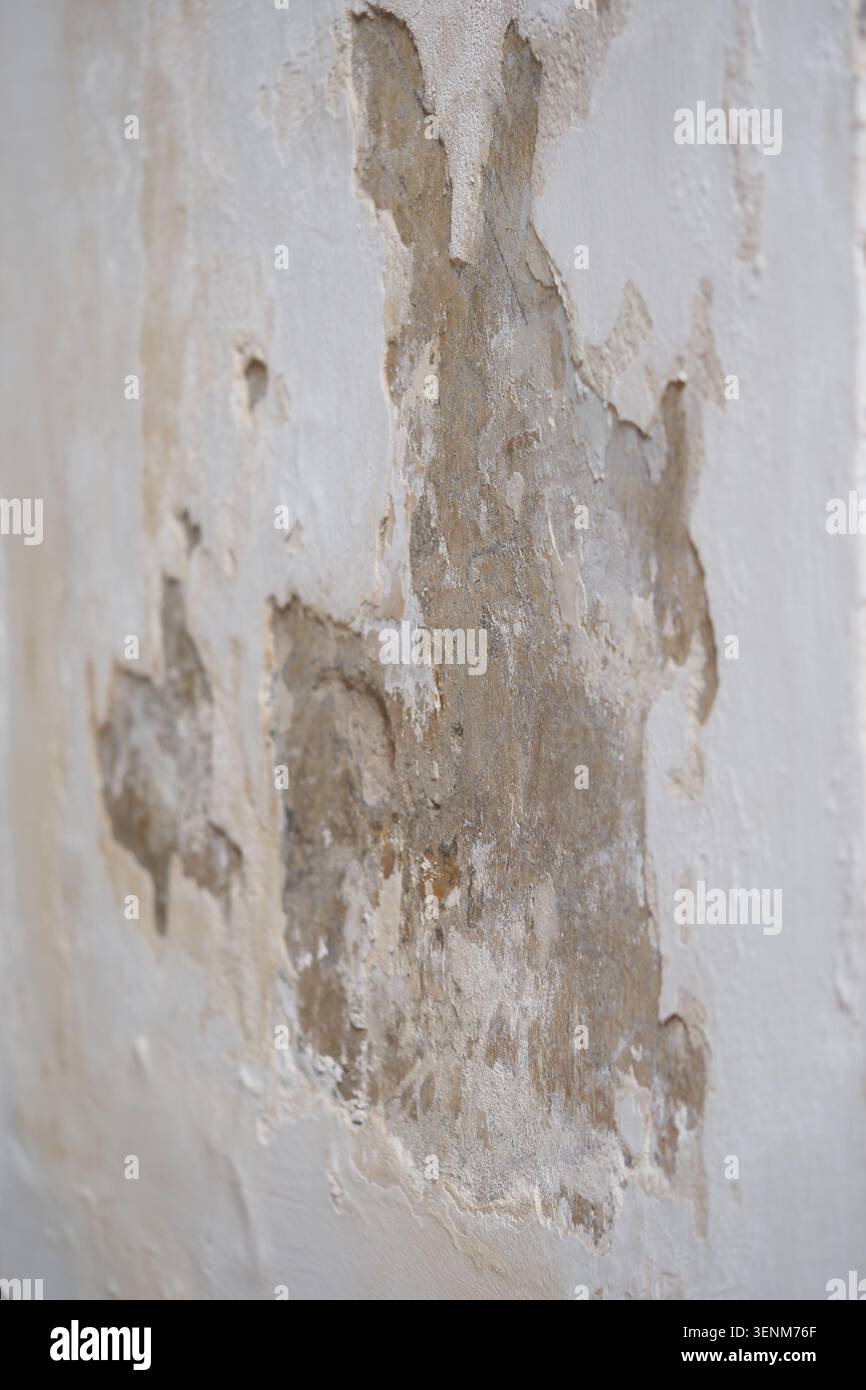 Old wall with peeling paint shows surface damage and wear Stock Photo ...