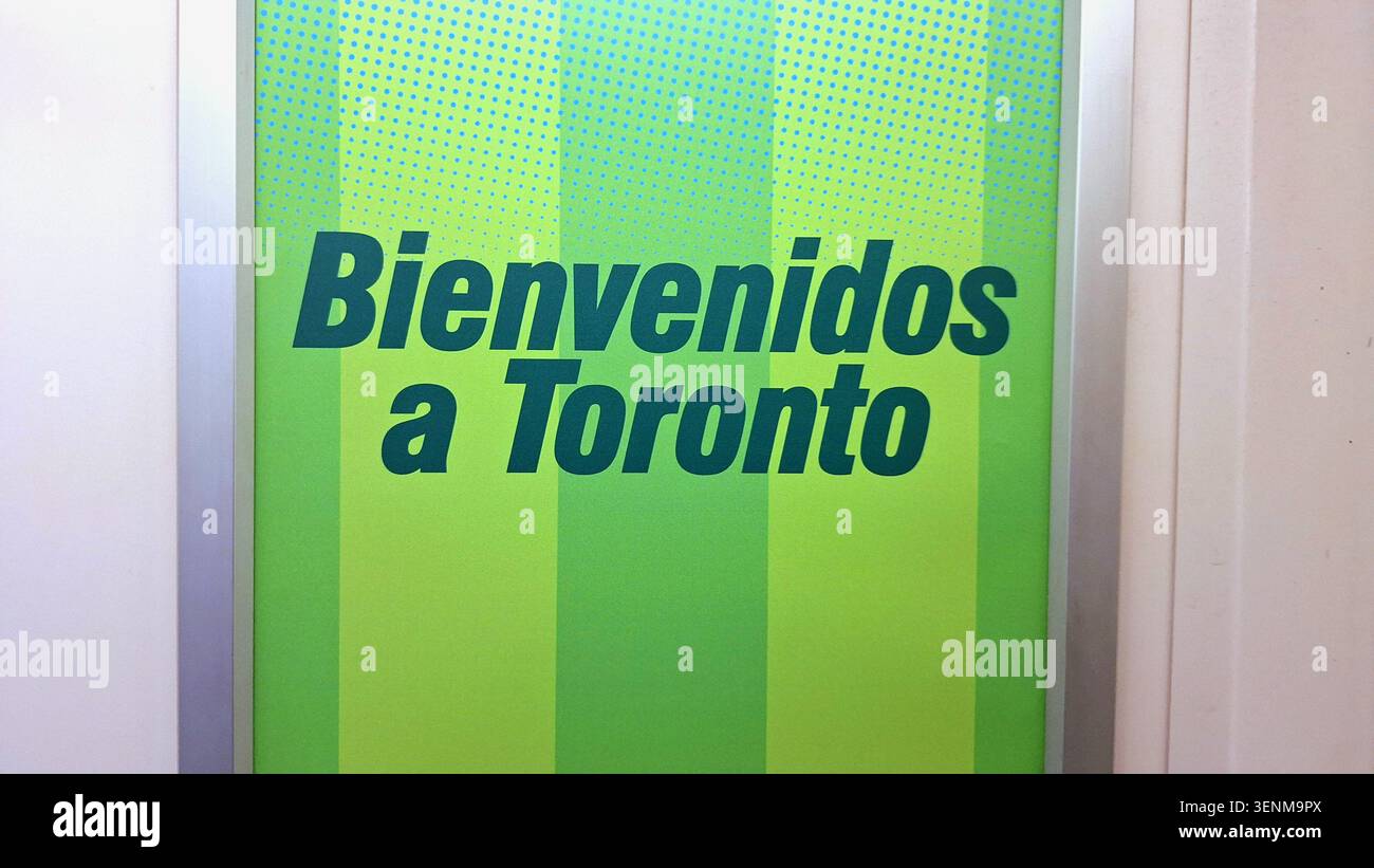 Toronto, ON, Canada - June 11, 2026: A vibrant green sign displays a ...