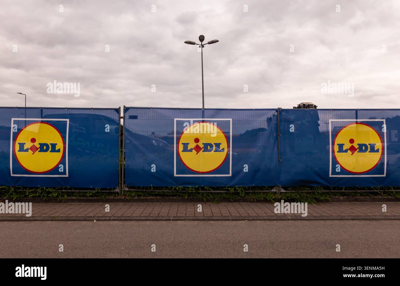 Wasserbillig, Luxemburg - June 10, 2026: Lidl logos printed on blue ...