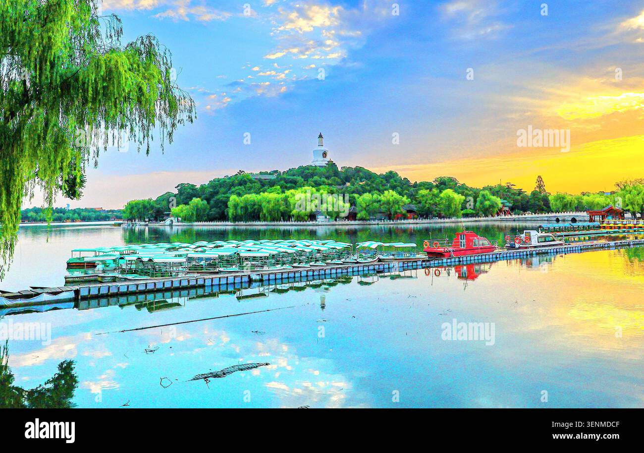 Morning glow illuminates the White Pagoda at Beihai Park in Beijing, 12 ...