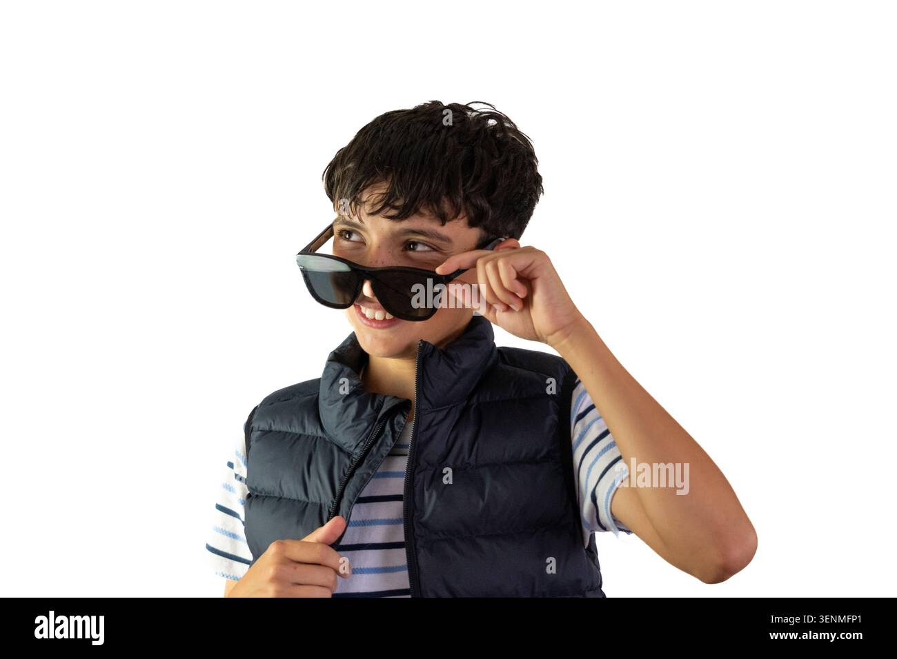 kids fashion. smiling boy in vest looking over his sunglasses, with ...