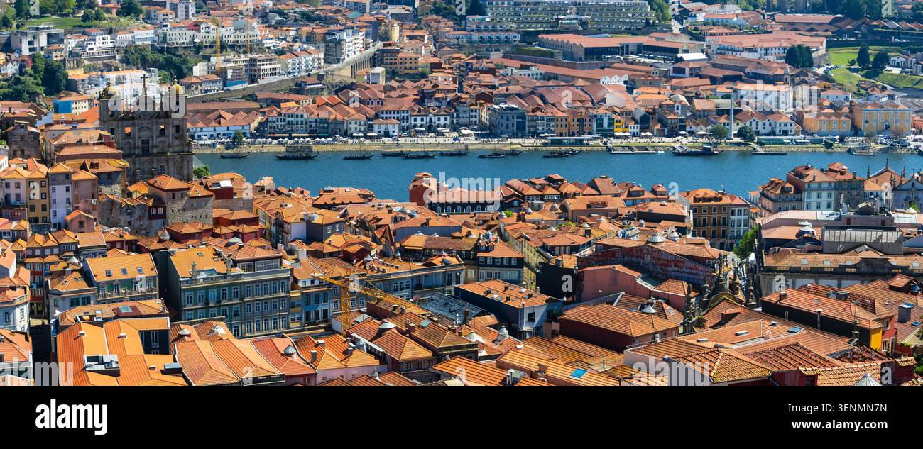Porto old town with terracotta roofs, historic buildings, and boats on ...