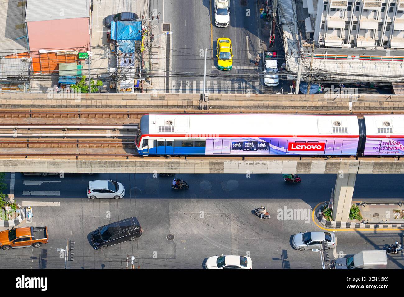 Aerial view BTS sky train runs through the street above Sukhumvit road ...