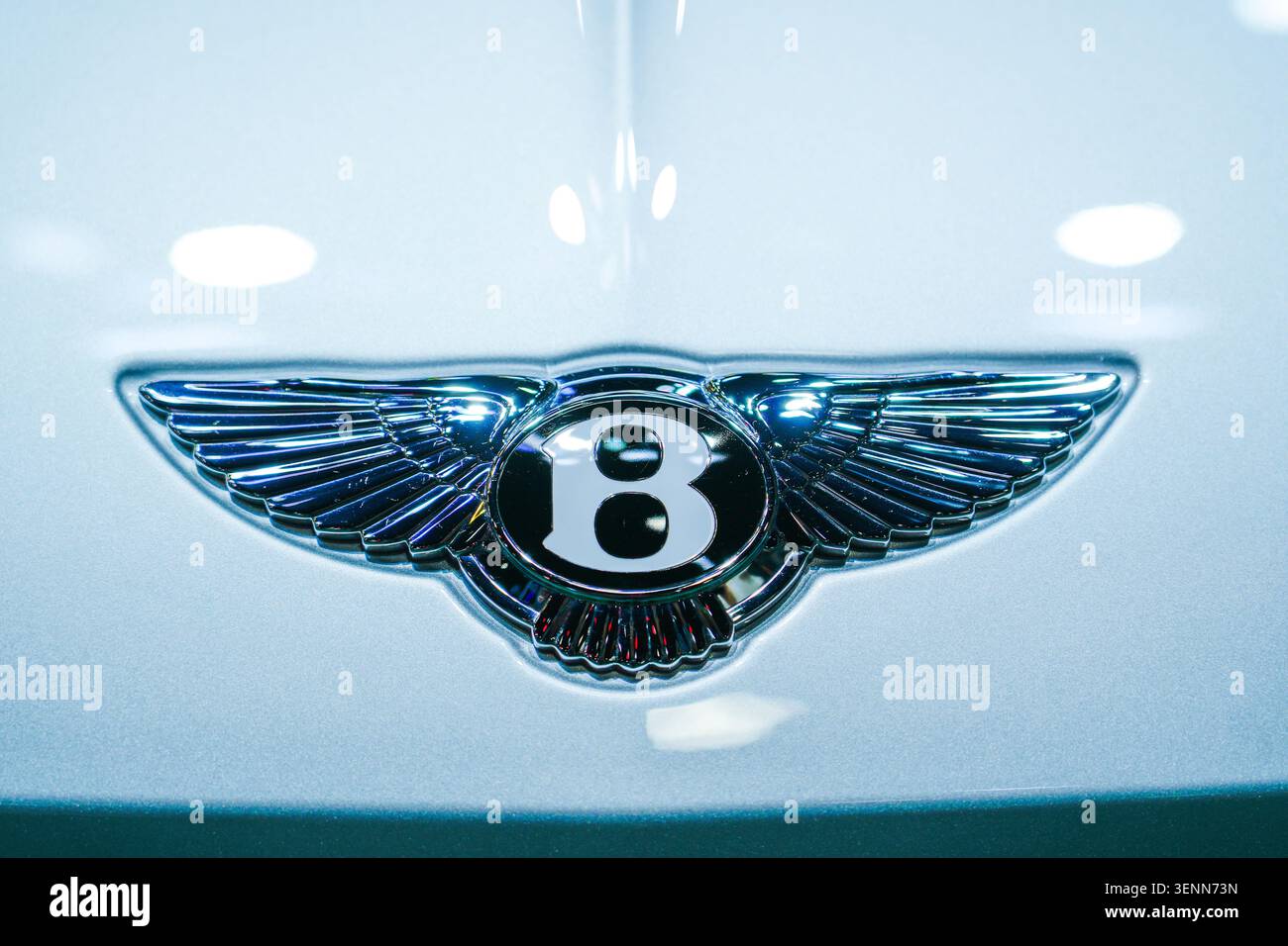 Luxurious white hybrid car Bentley Bentayga logo. Thailand, Bangkok 07 ...