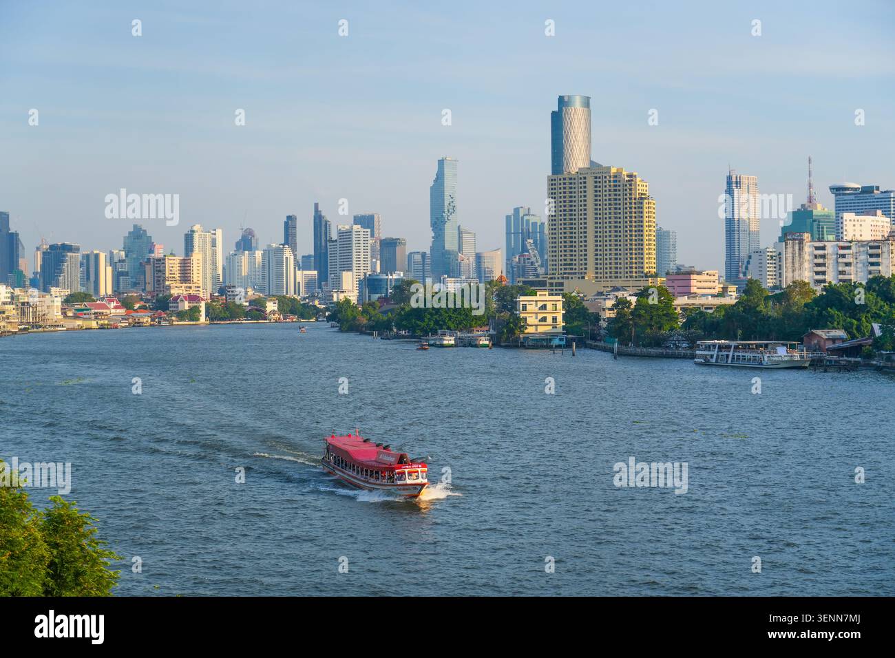 Boat ship traffic and tourist taking river cruise on Chao Phraya with ...