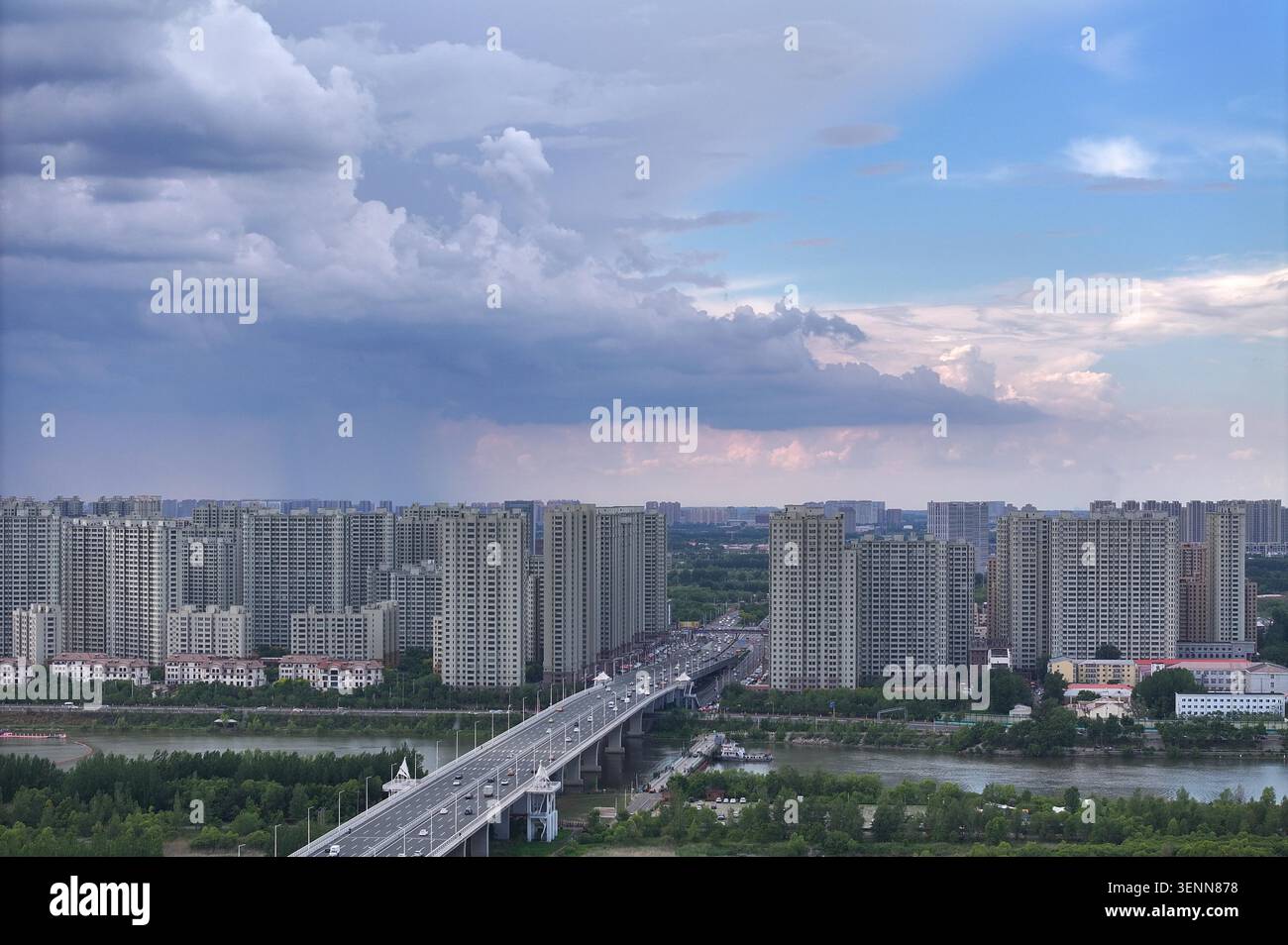 Dark clouds gather over Songpu Bridge and Alejin Island National ...