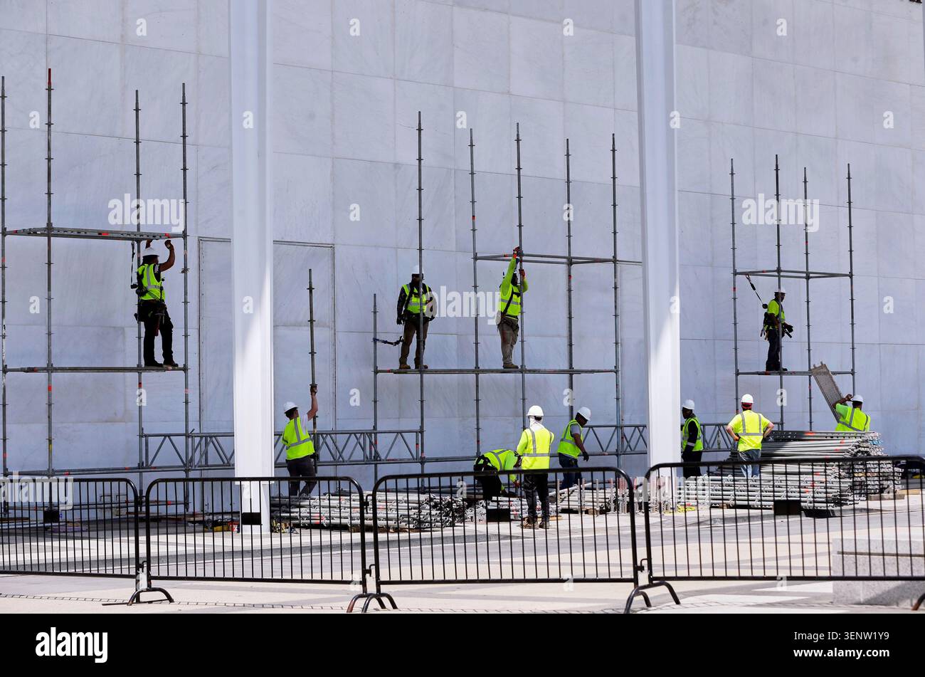 Workers build scaffolds at the John F. Kennedy Center for the ...