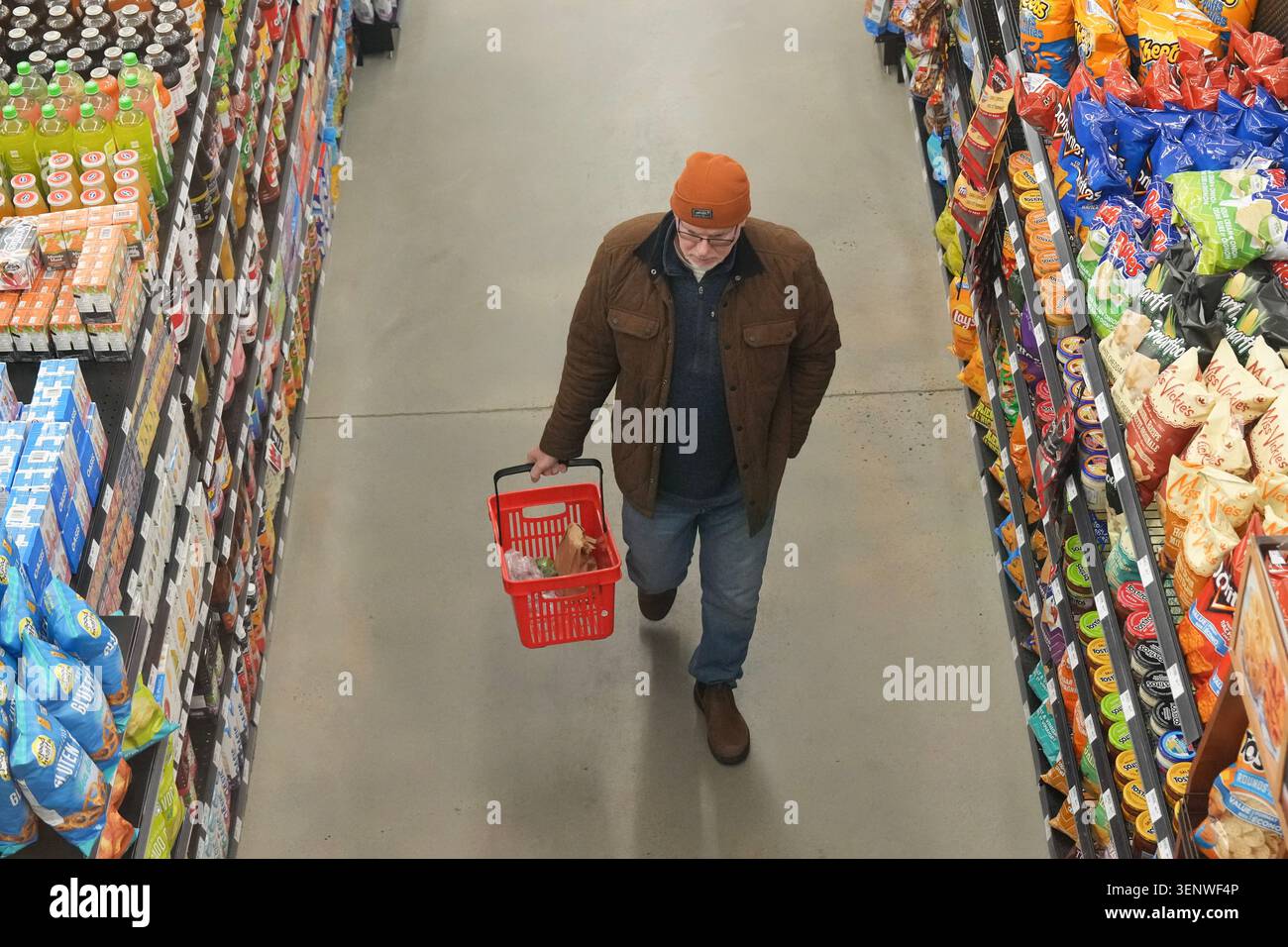 A customer shops at Vince‚Äôs Market, a grocery store in Sharon ...