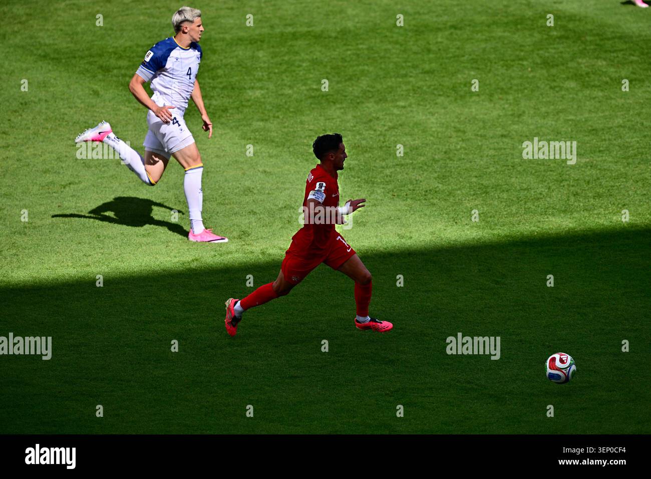 Bosnia and Herzegovina's Tarik Muharemovic (4) and Canada's Stephen ...