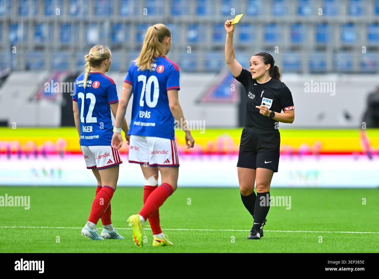 Oslo 20260613. Referee Karoline Marie Jensen with a yellow card to ...