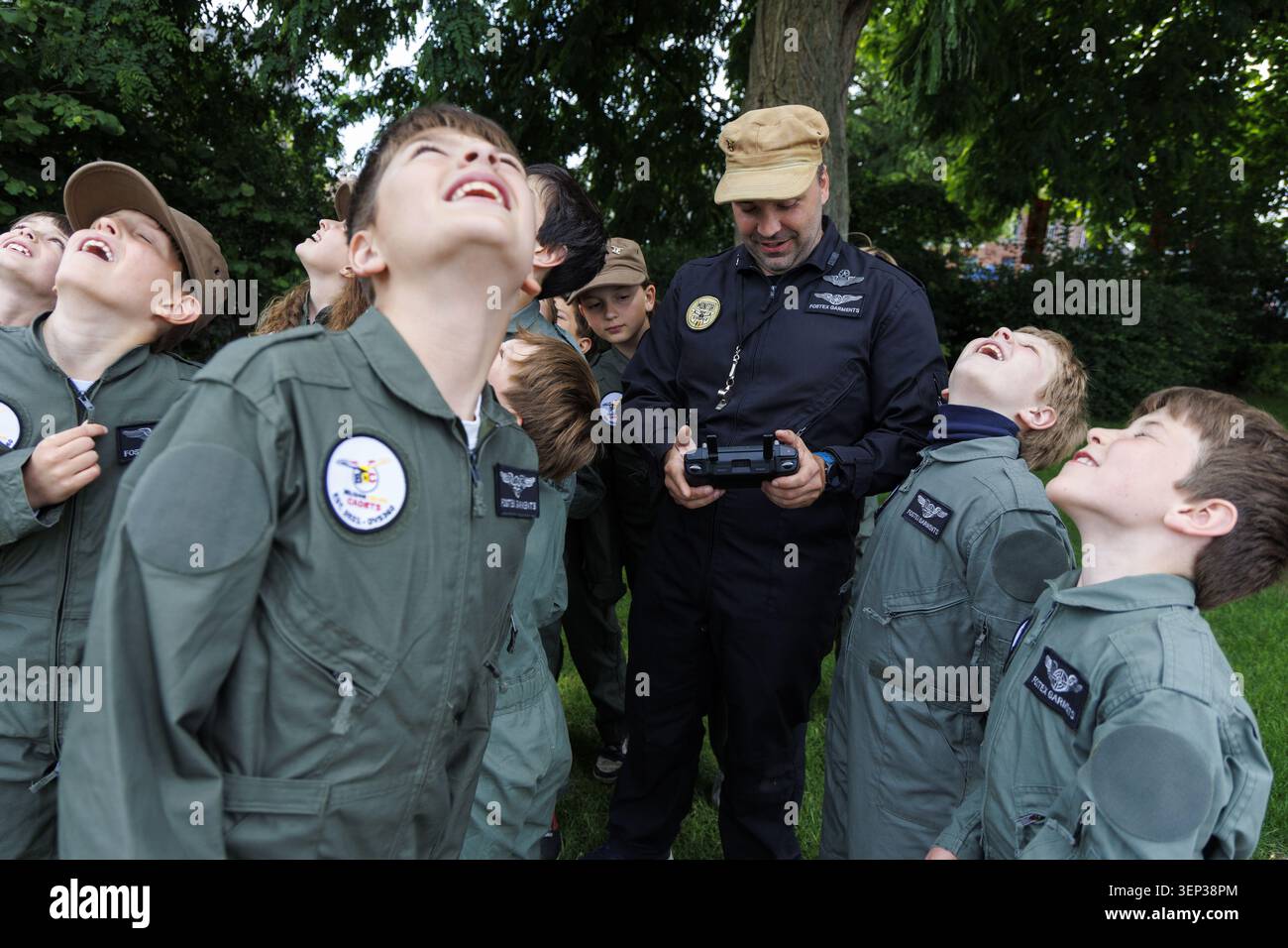 Kids learn to operate a drone whilst playing pictured during a 'drone ...