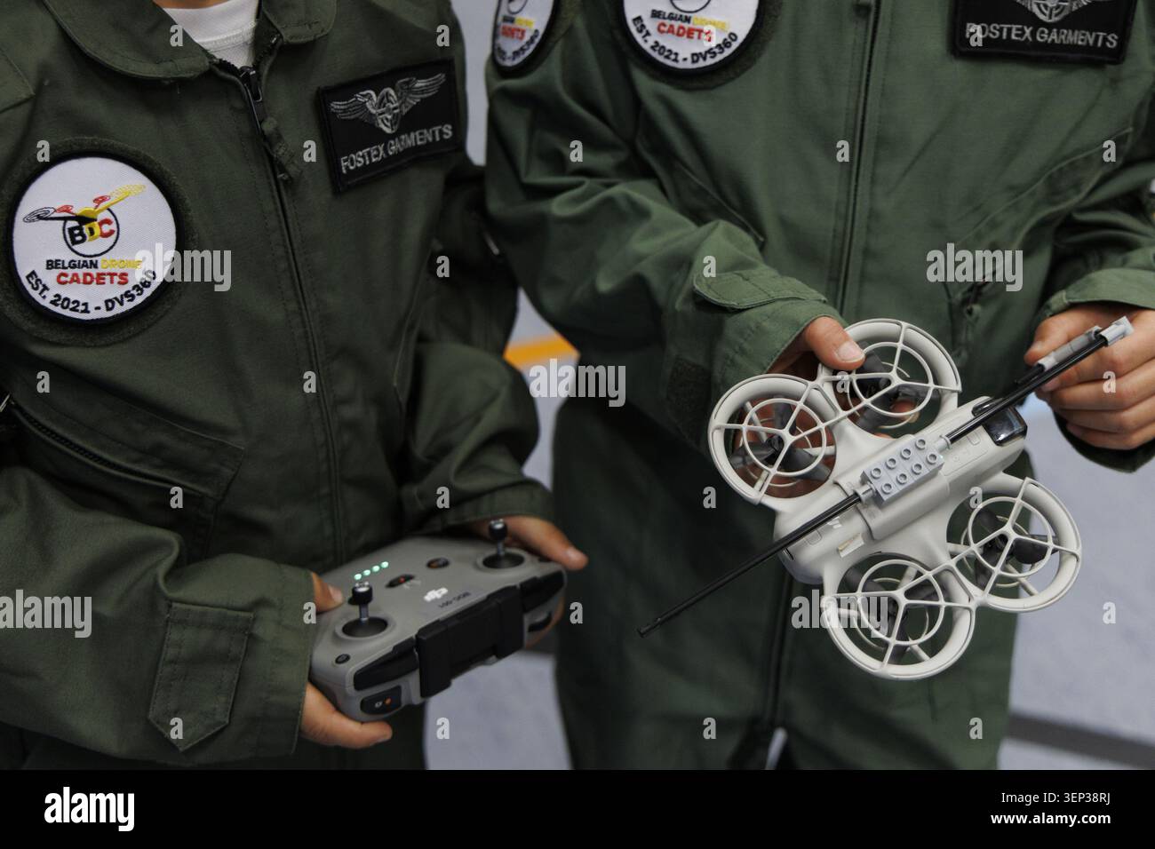 Kids learn to operate a drone whilst playing pictured during a 'drone ...
