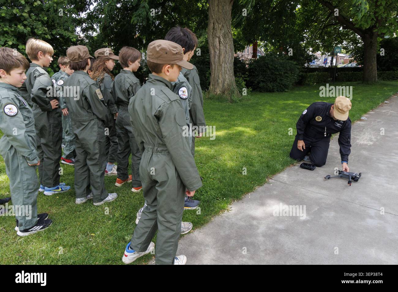 Kids learn to operate a drone whilst playing pictured during a 'drone ...