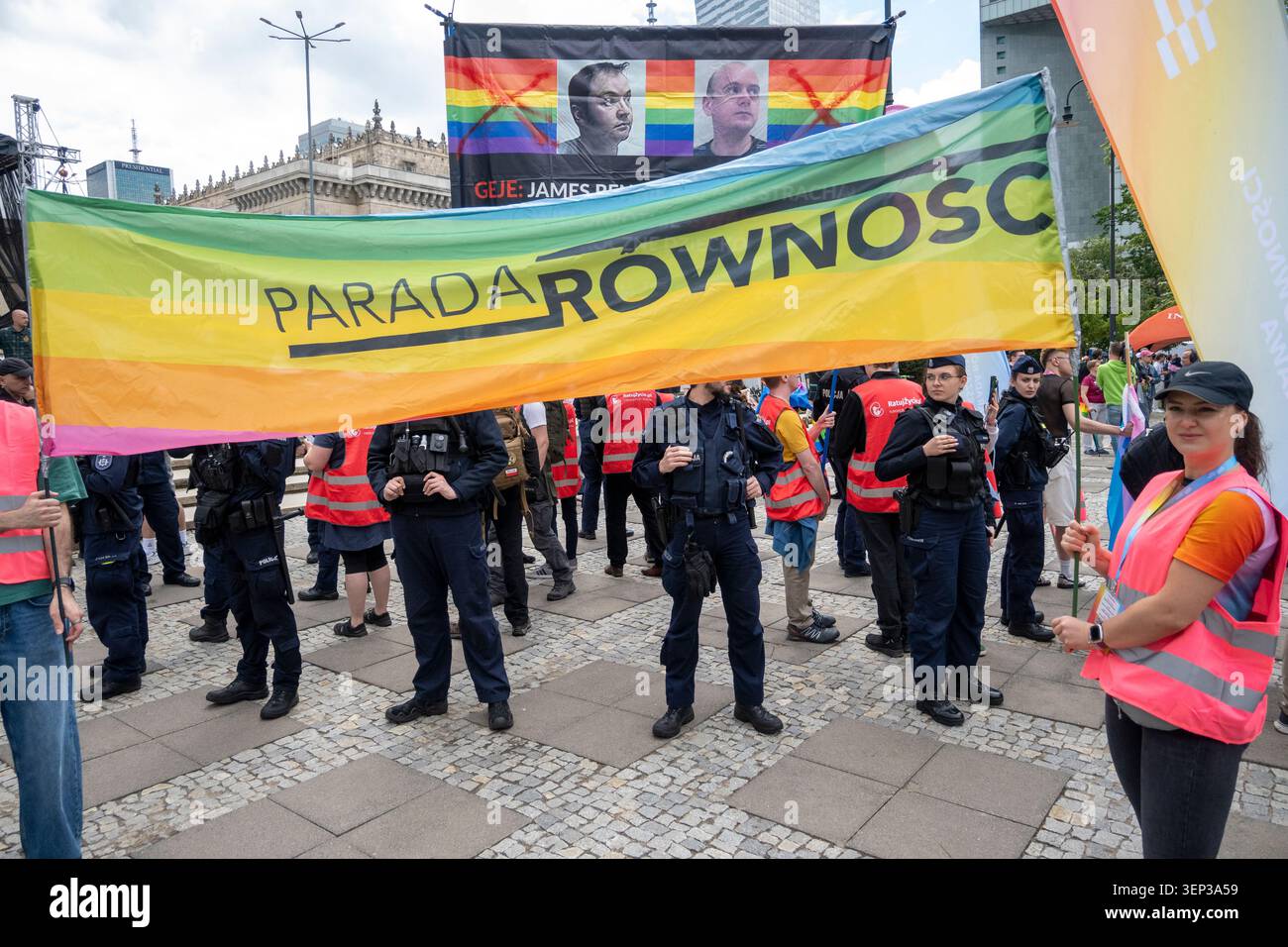 Warsaw, Poland. 13 June 2026. Volunteers of Warsaw Pride standing with ...