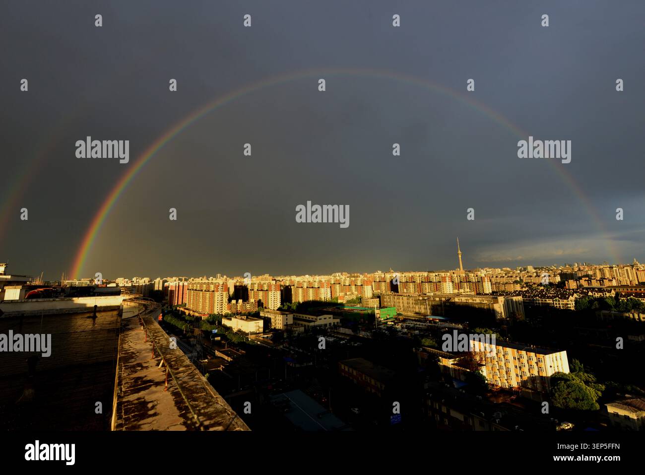 BEIJING, CHINA - JUNE 13, 2026 - Double rainbows appear in the sky ...