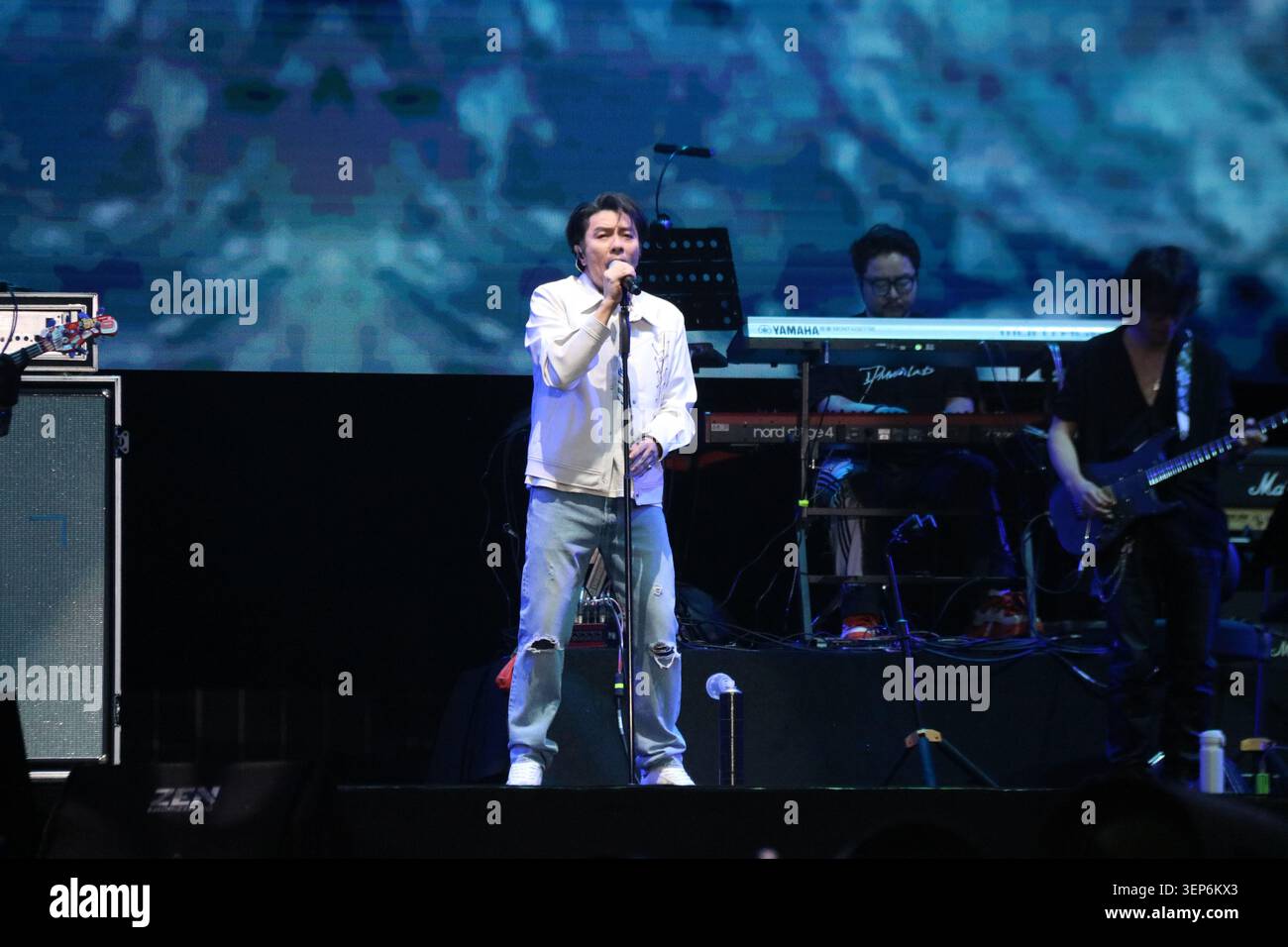 Chinese singer Adu performs during the Super Music Stars LIVE Concert ...
