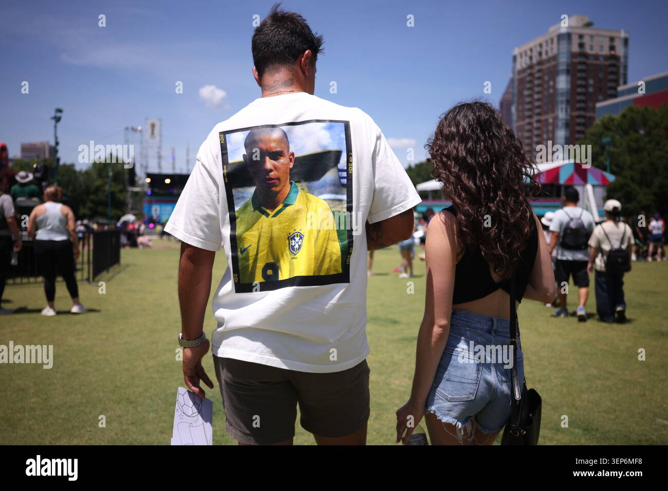A Brazil fan wears a Ronaldo t-shirt ahead of Brazil's game with ...