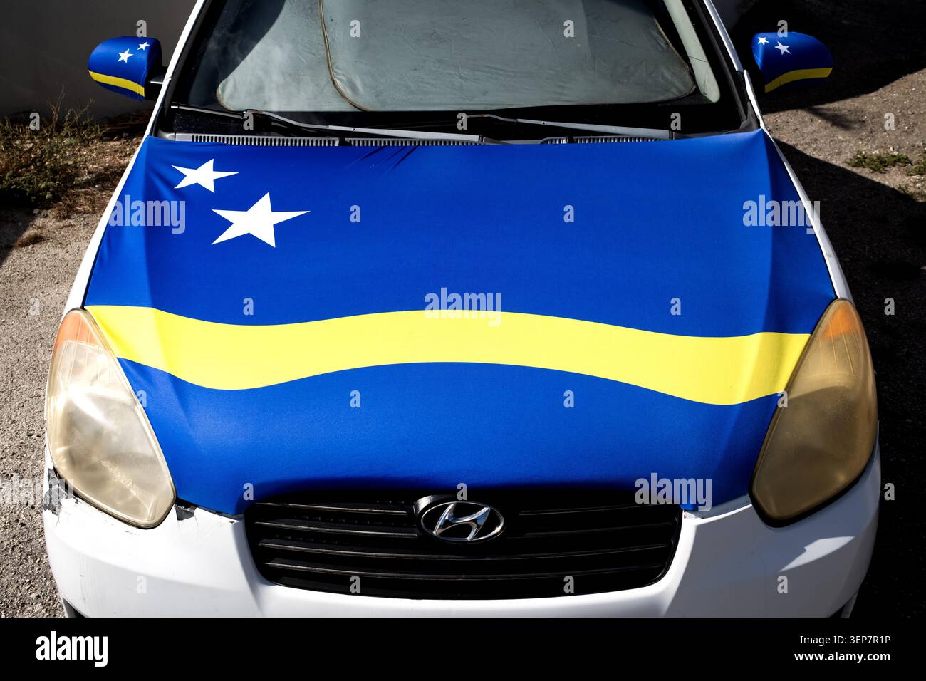 WILLEMSTAD - The flags of Curaçao on a car. For Curaçao, the football ...
