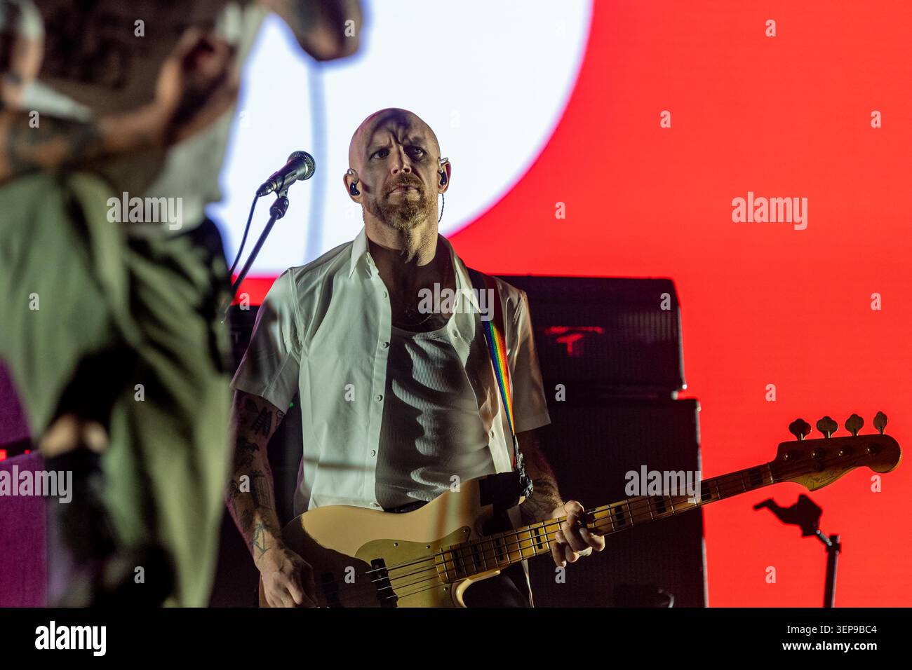 Adam Devonshire, bassist of the British punk band IDLES, performs ...