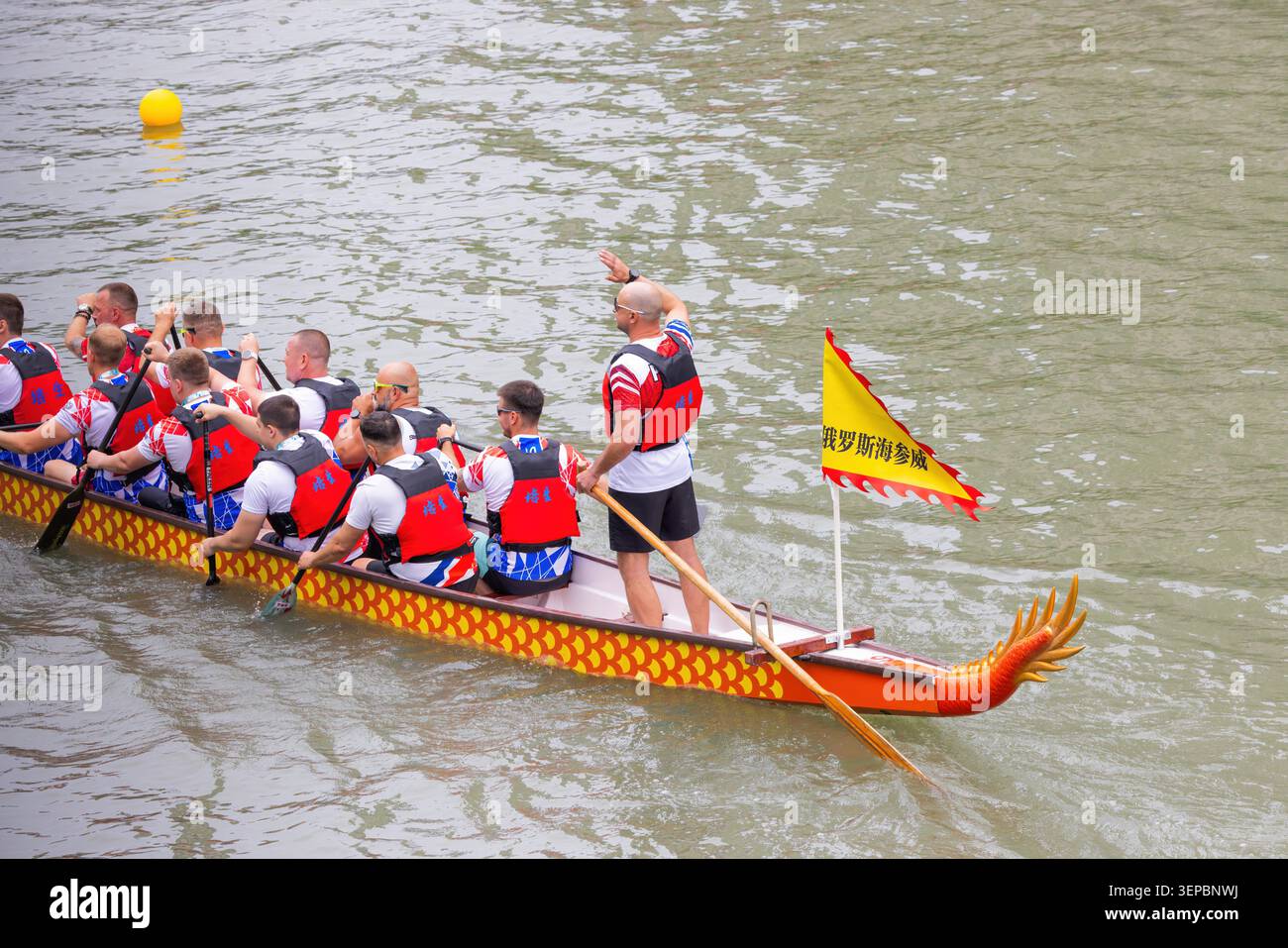 Members of the Russian Vladivostok team compete during the Suzhou River ...