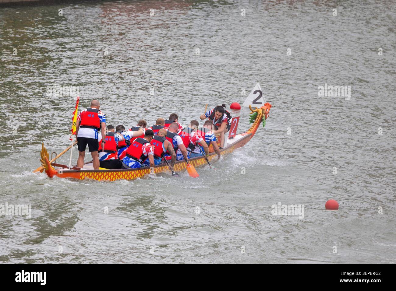 Members of the Russian Vladivostok team compete during the Suzhou River ...