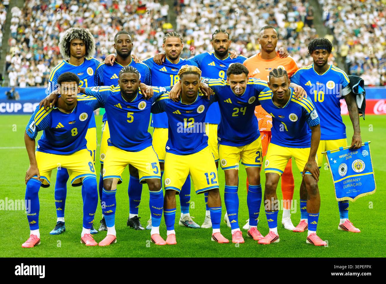 Curaçao players pose before the World Cup Group E soccer match between ...