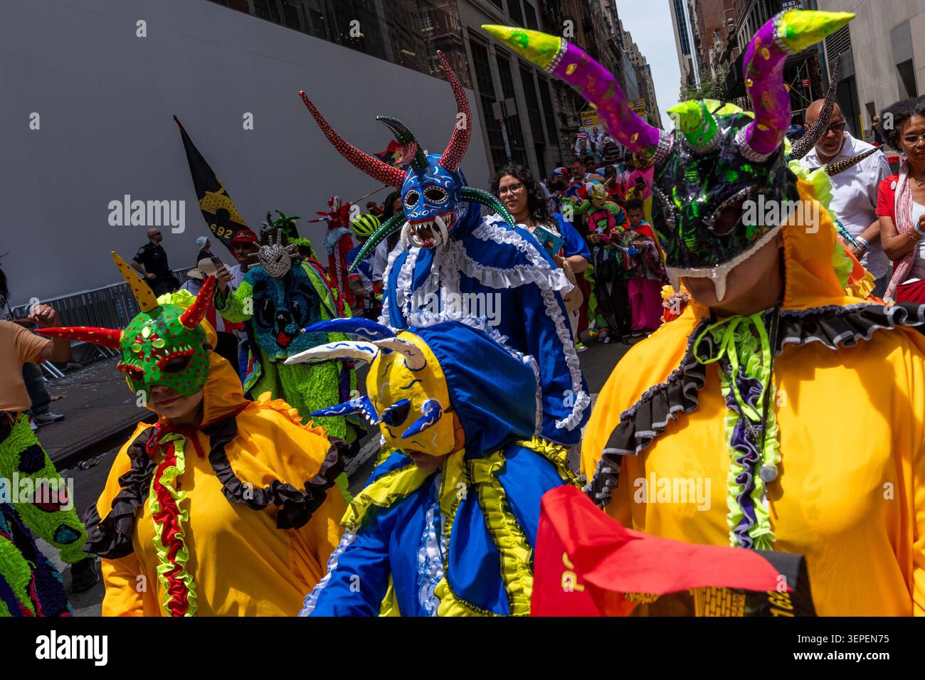 People in costume take part in the National Puerto Rican Day Parade ...