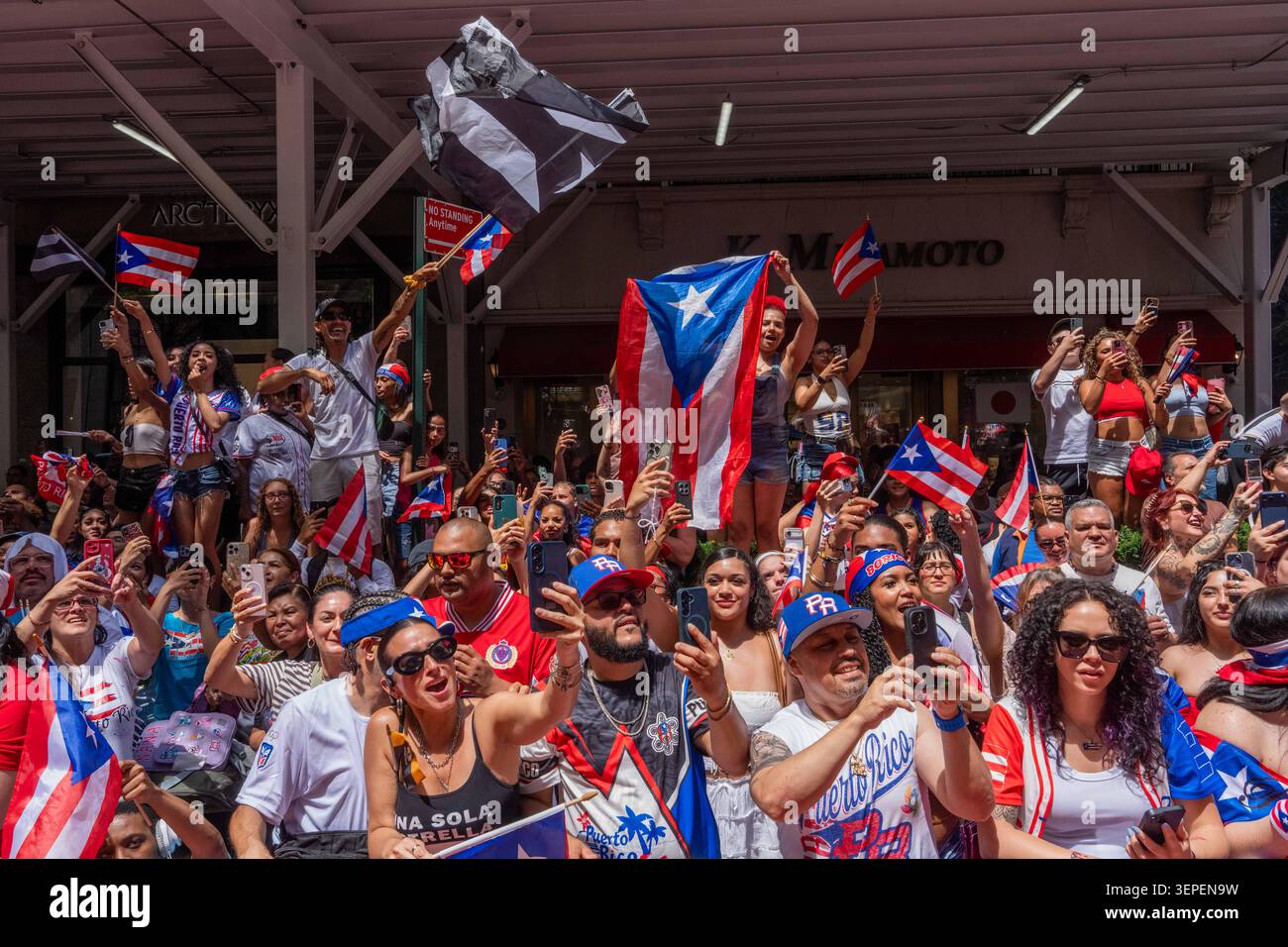Crowds watch the National Puerto Rican Day Parade, Sunday, June 14 ...