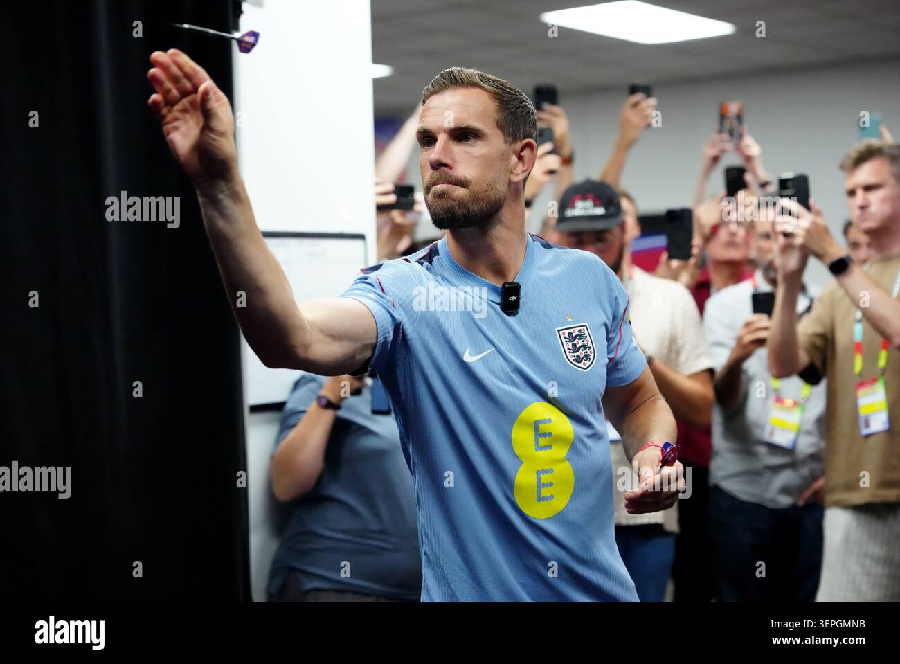 England's Jordan Henderson plays darts during media activity at KC ...