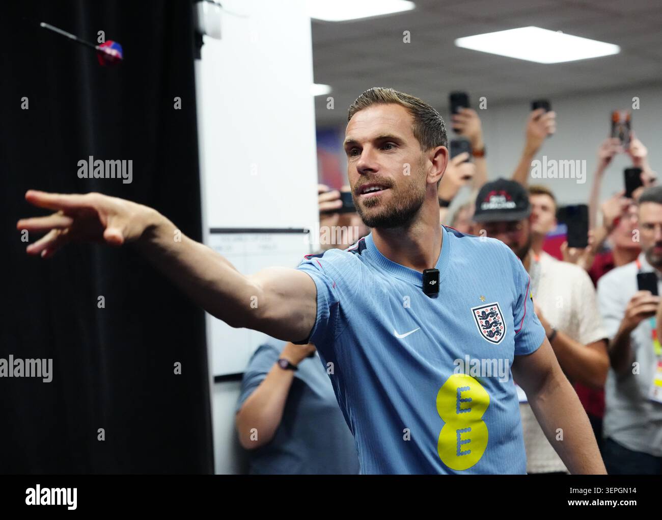 England's Jordan Henderson plays darts during media activity at KC ...