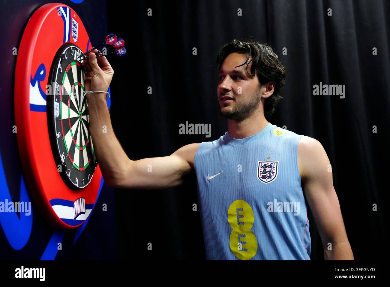 England's James Trafford plays darts during media activity at KC Parks ...
