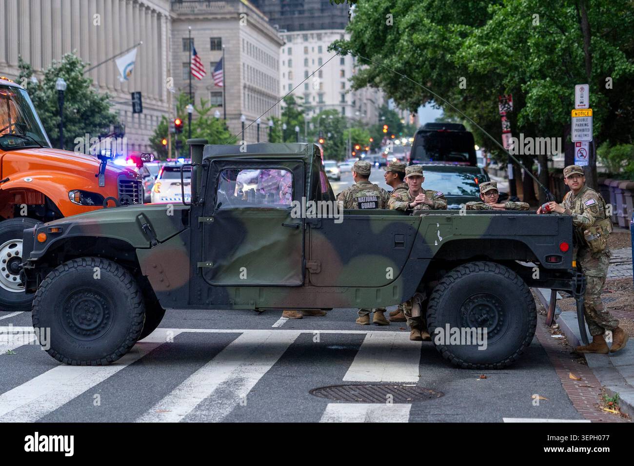 National Guard troops patrol the streets ahead of a UFC fight on the ...