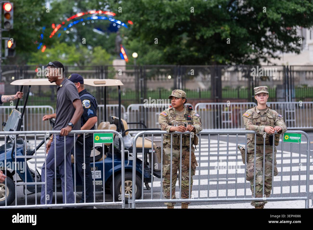 National Guard troops patrol the streets ahead of a UFC fight on the ...
