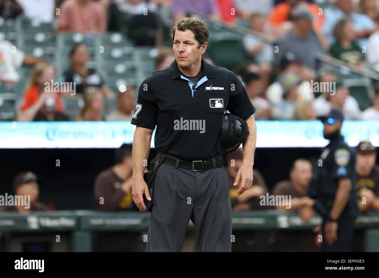 Umpire Ben May looks on during a baseball game between the Baltimore ...